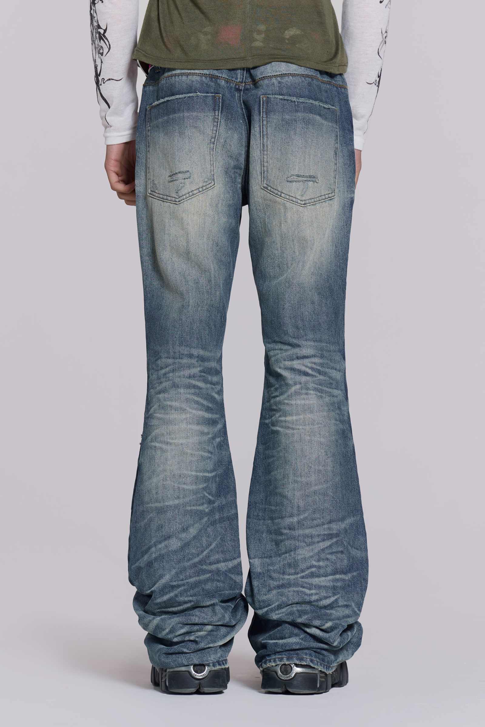 Mid Blue Distressed Creased Drift Flared Jeans | Jaded London | Clothing